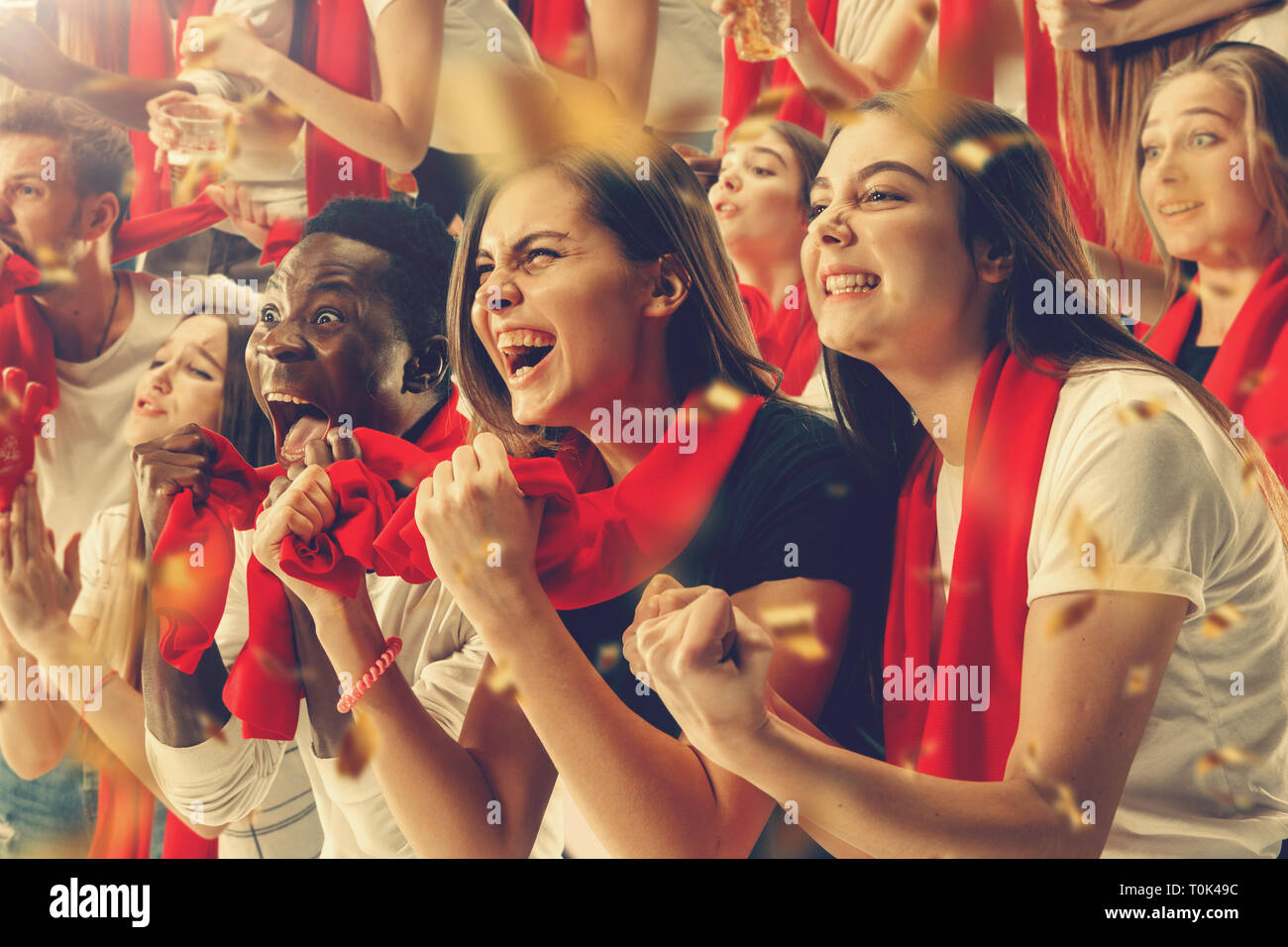 Group of happy fans are cheering for their team victory Stock Photo - Alamy