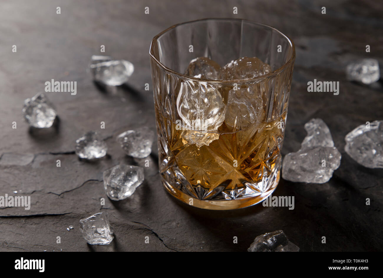 Glass of whisky with crushed ice Stock Photo - Alamy