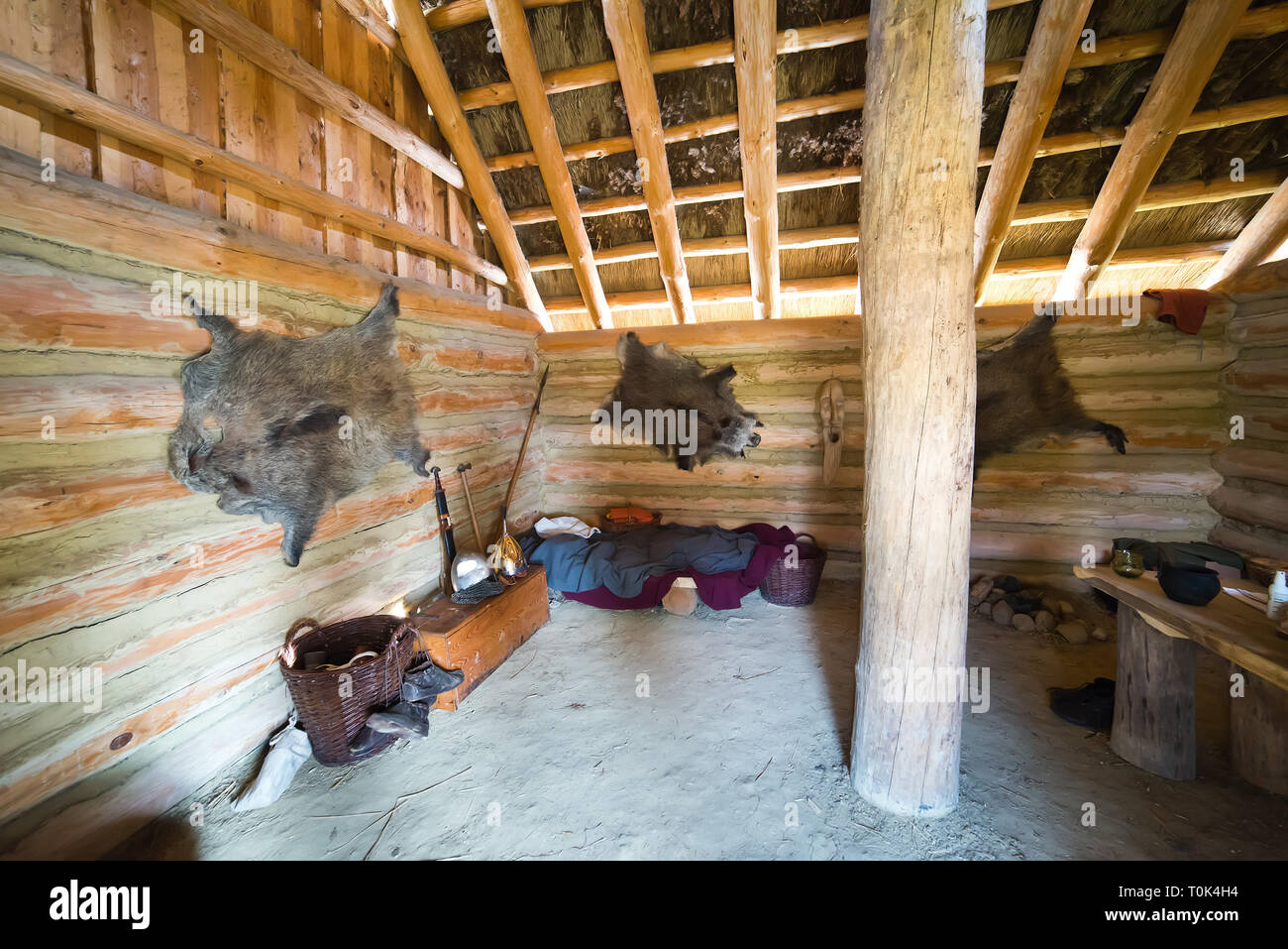 Inside of slavic hunter's hut Stock Photo - Alamy