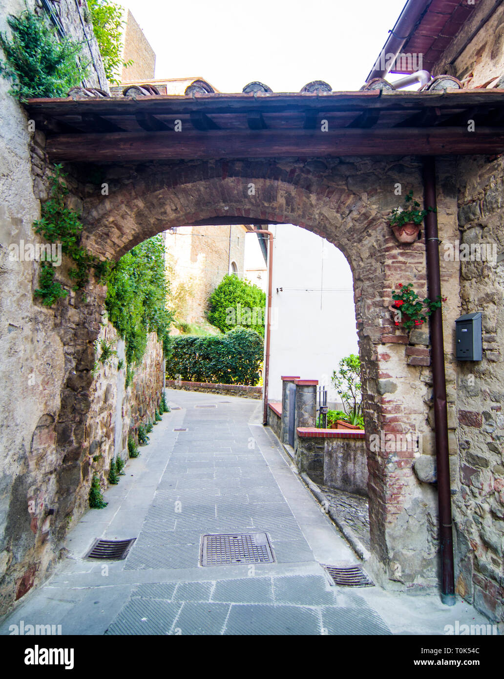 historic village with ancient and modern arch, typical architecture of ...