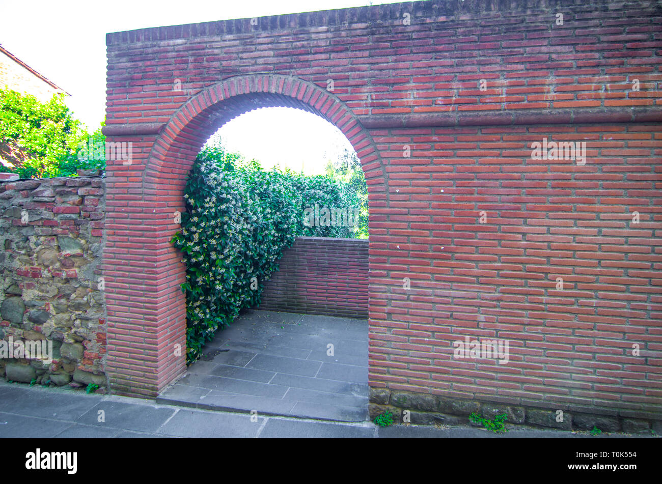 historic village with ancient and modern arch, typical architecture of ...