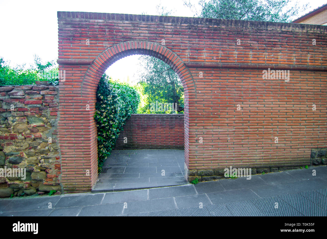 historic village with ancient and modern arch, typical architecture of ...