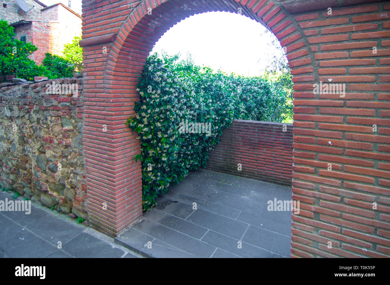 historic village with ancient and modern arch, typical architecture of ...