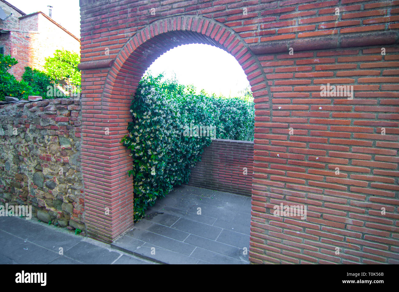 historic village with ancient and modern arch, typical architecture of ...