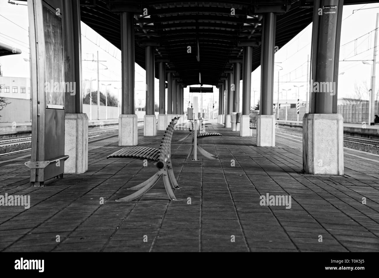 Empty train station, iron chair or bench in empty platform Stock Photo ...