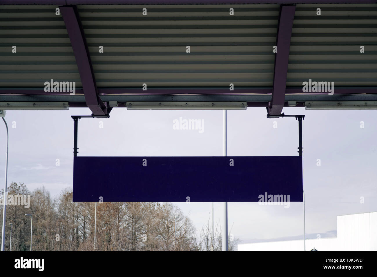 Empty train station sign with place for name, mock-up Stock Photo - Alamy