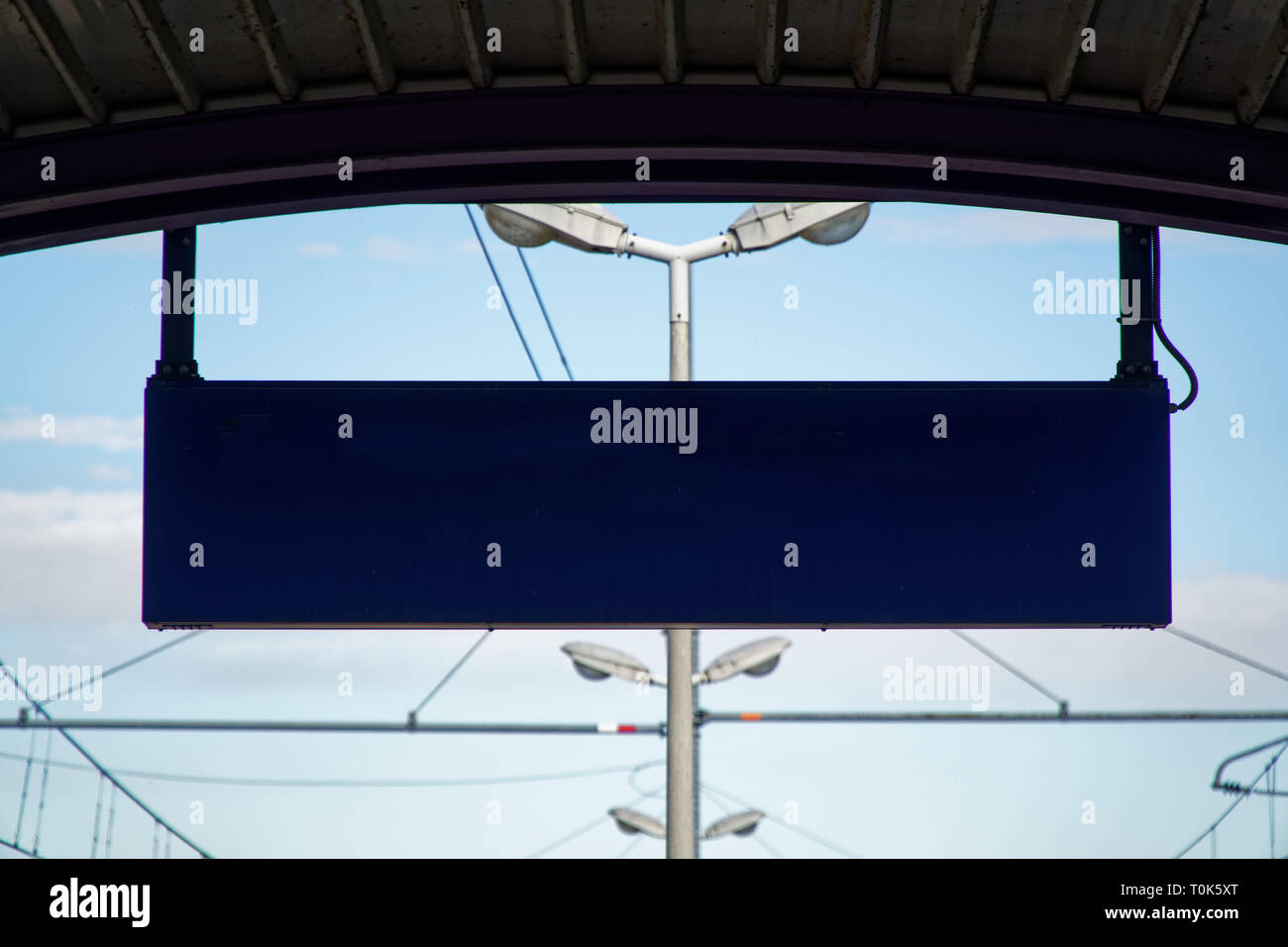 Empty train station sign with place for name, mock-up Stock Photo - Alamy