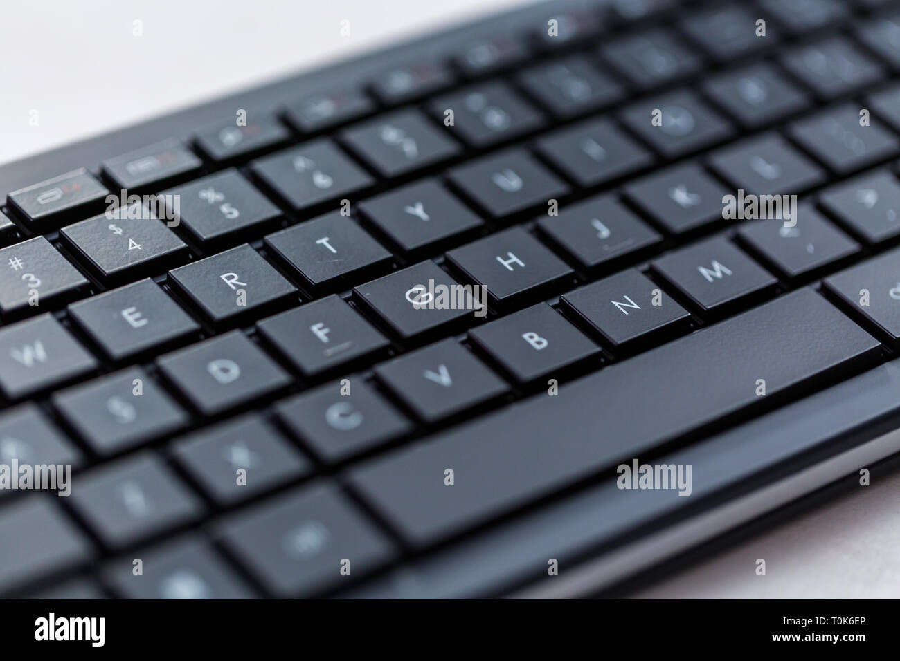 Modern black computer keyboard with flat keys Stock Photo - Alamy