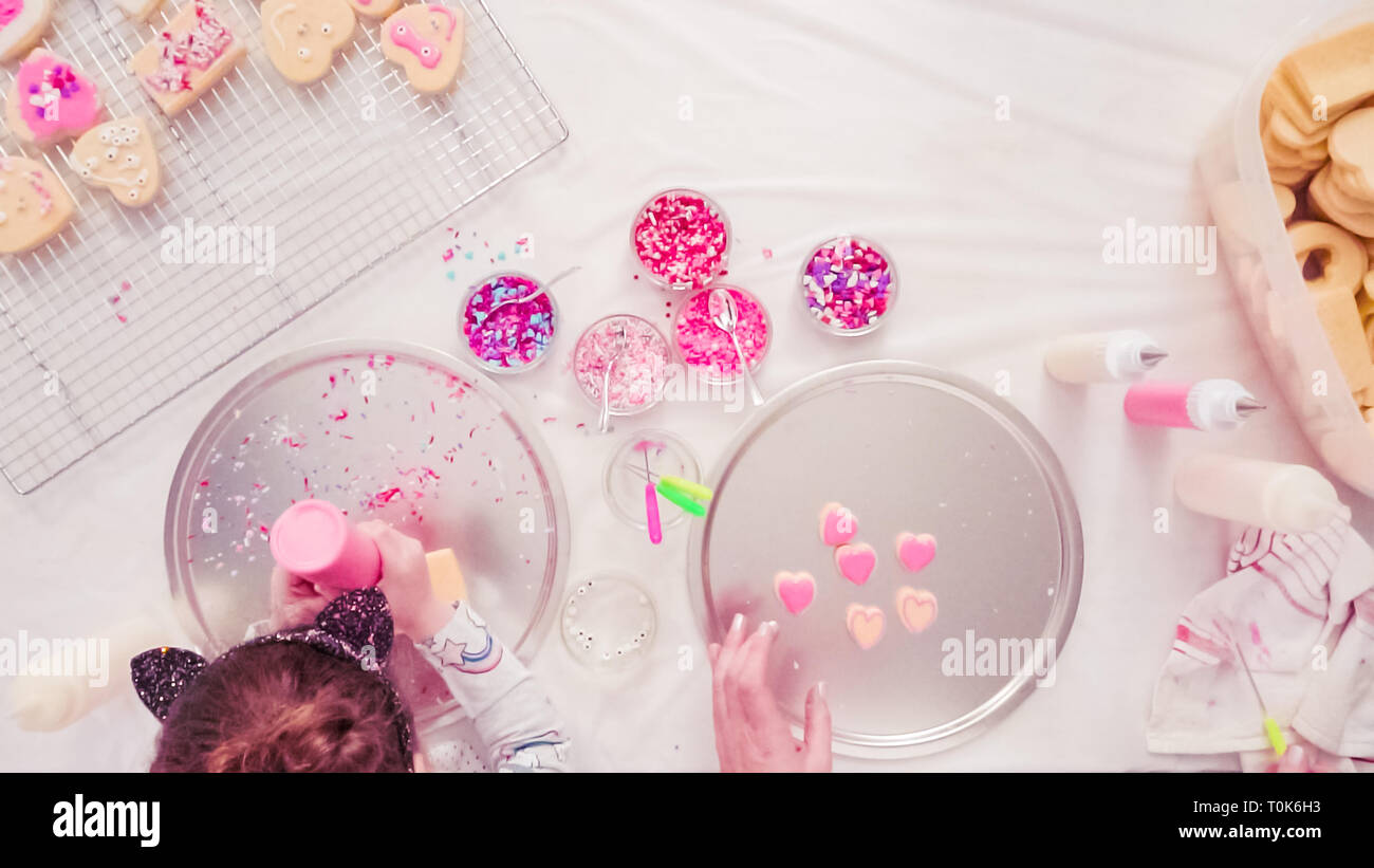 Flat lay. Step by step. Decorating sugar cookies with royal icing and ...