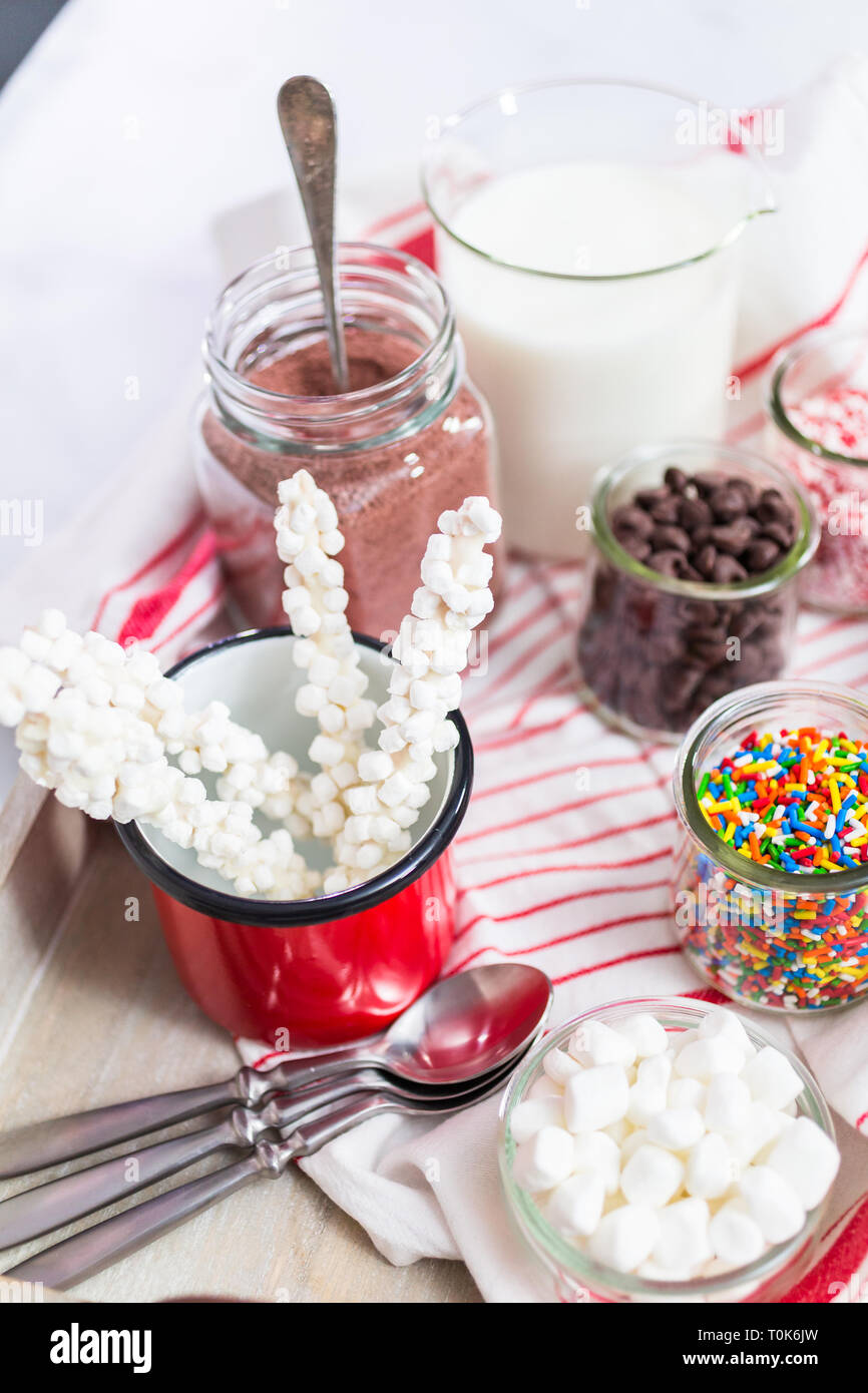 Hot chocolate bar with variety of topping on the tray Stock Photo - Alamy