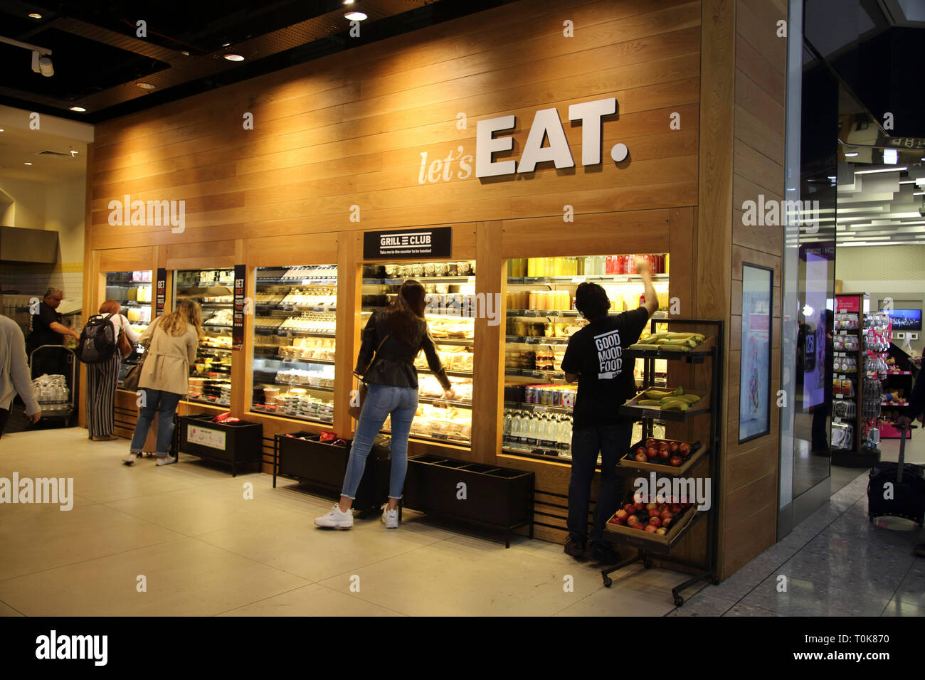 England Heathrow Airport Terminal Two Passengers Shopping for Food in ...