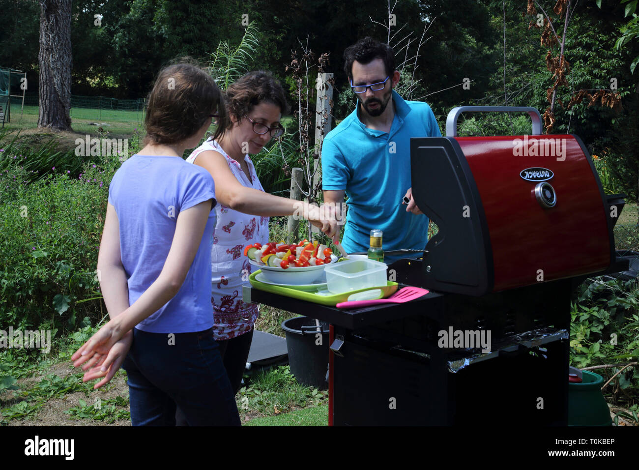 Woman Cooking Bbq Garden High Resolution Stock Photography and Images ...