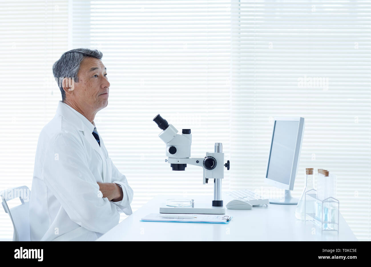 Senior Japanese researcher in the lab Stock Photo - Alamy