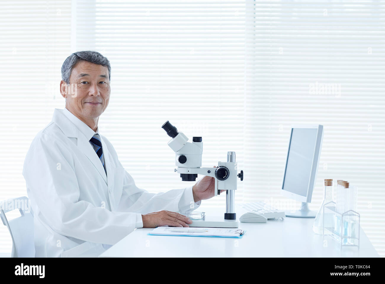 Senior Japanese researcher in the lab Stock Photo - Alamy