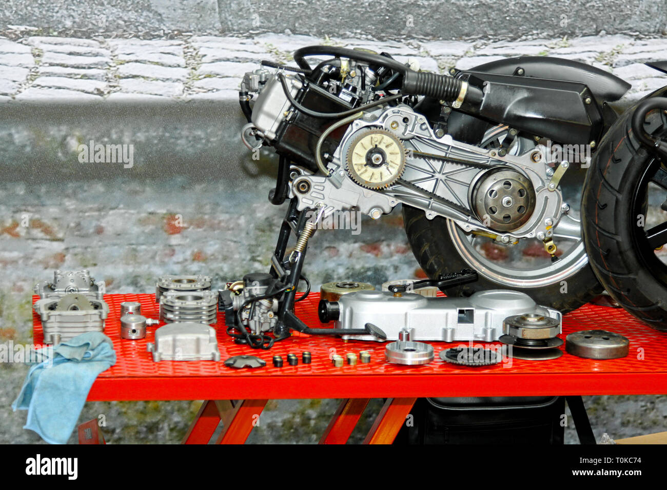 Repair garage bench for scooters and motorcycles Stock Photo - Alamy