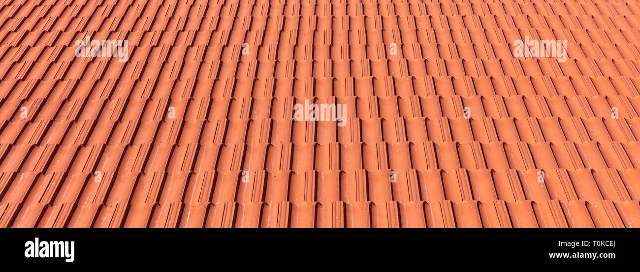 Roofing construction. Red roof ceramic tiles texture background, banner ...