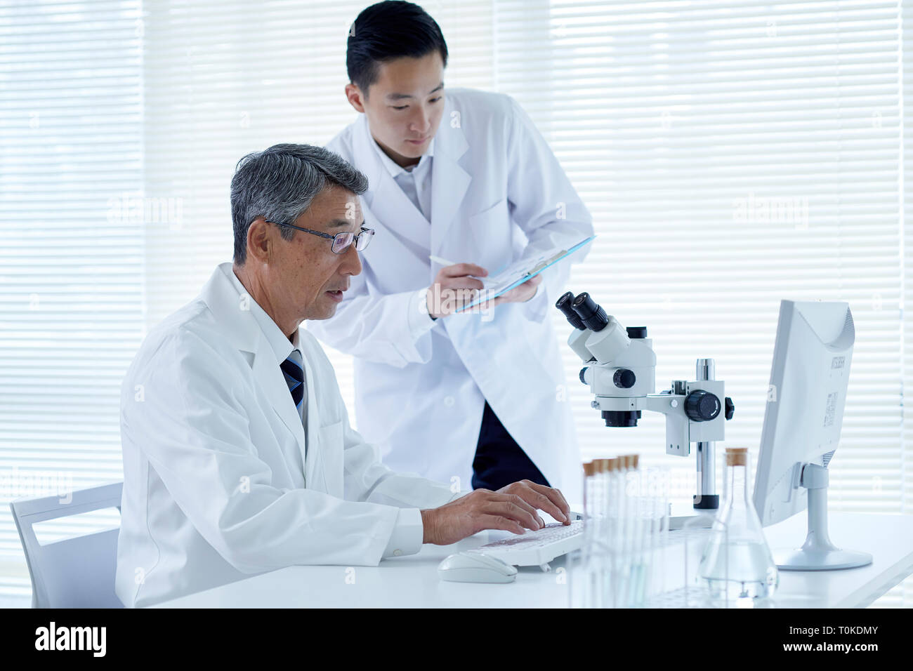 Japanese researchers in the lab Stock Photo - Alamy