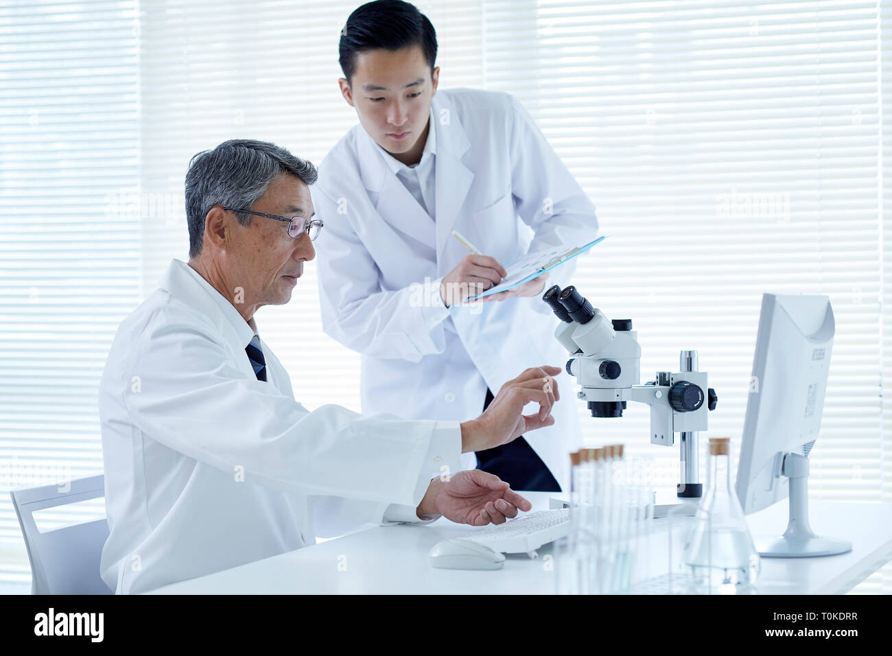 Japanese researchers in the lab Stock Photo - Alamy