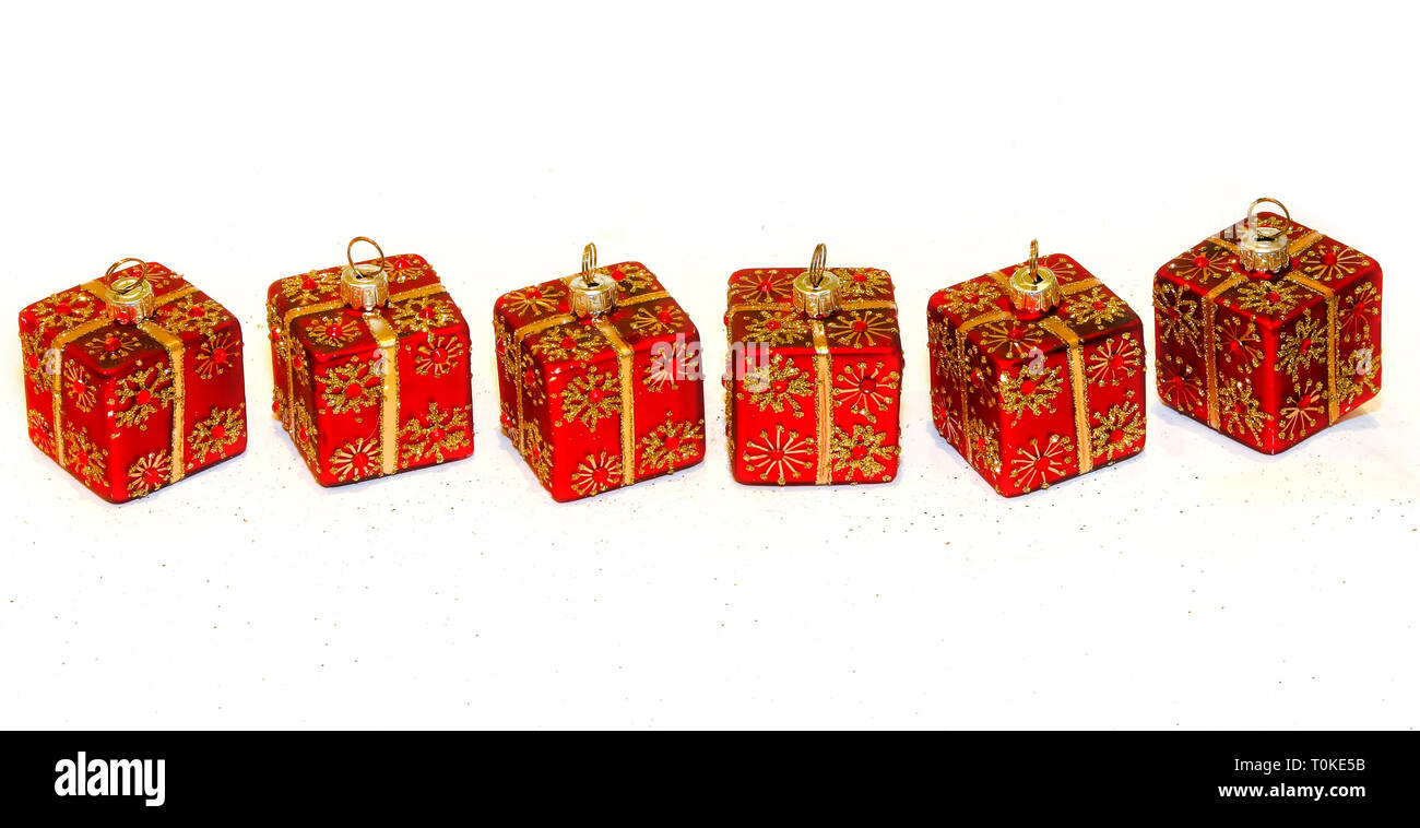 Set of six red Christmas ornaments in gift shape Stock Photo - Alamy