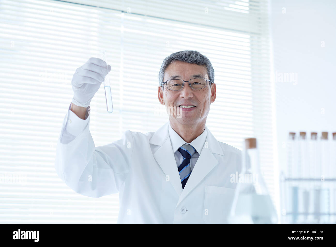 Senior Japanese researcher in the lab Stock Photo - Alamy