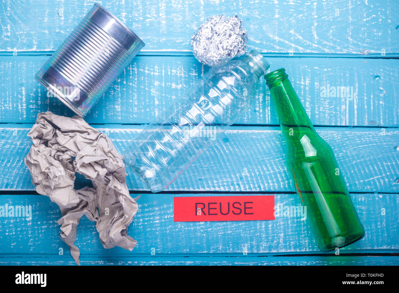 Recycle concept showing waste products of paper, glass, plastic, foil ...