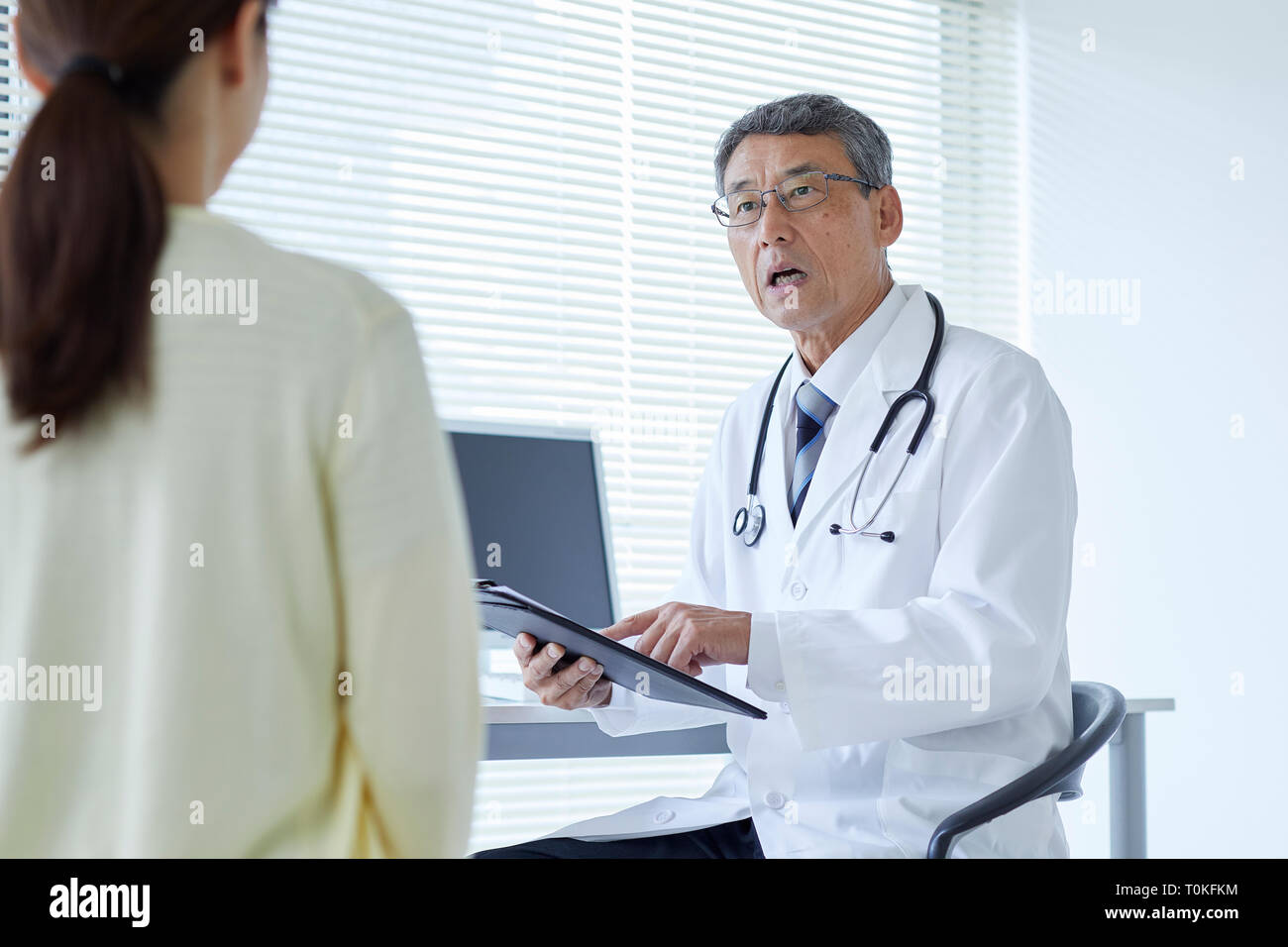 Japanese doctor at work Stock Photo - Alamy