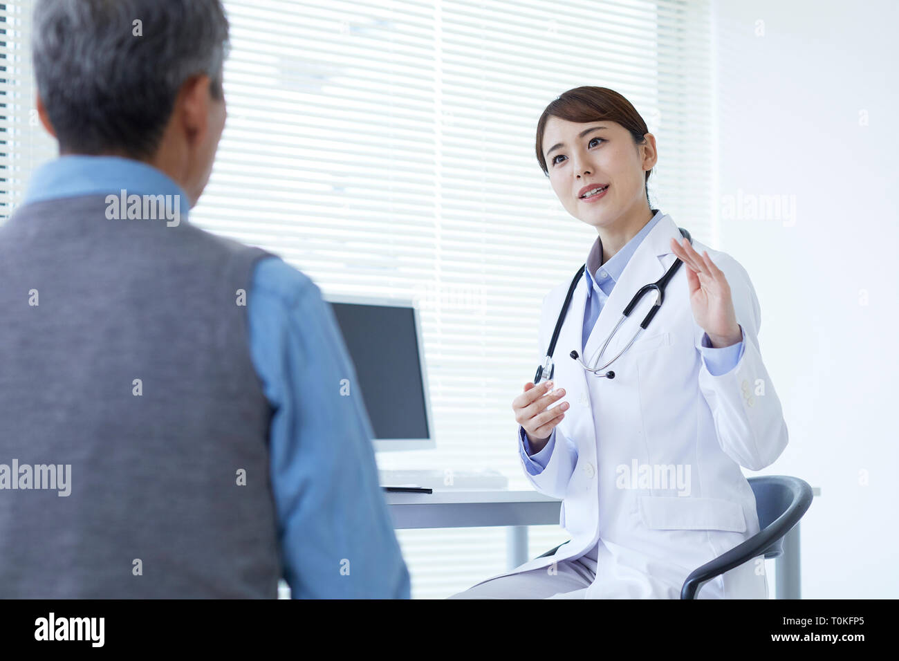 Japanese doctor at work Stock Photo - Alamy
