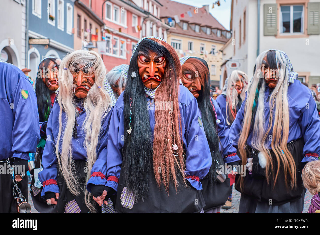 Group of witches in violet black robes. Street Carnival in Southern ...