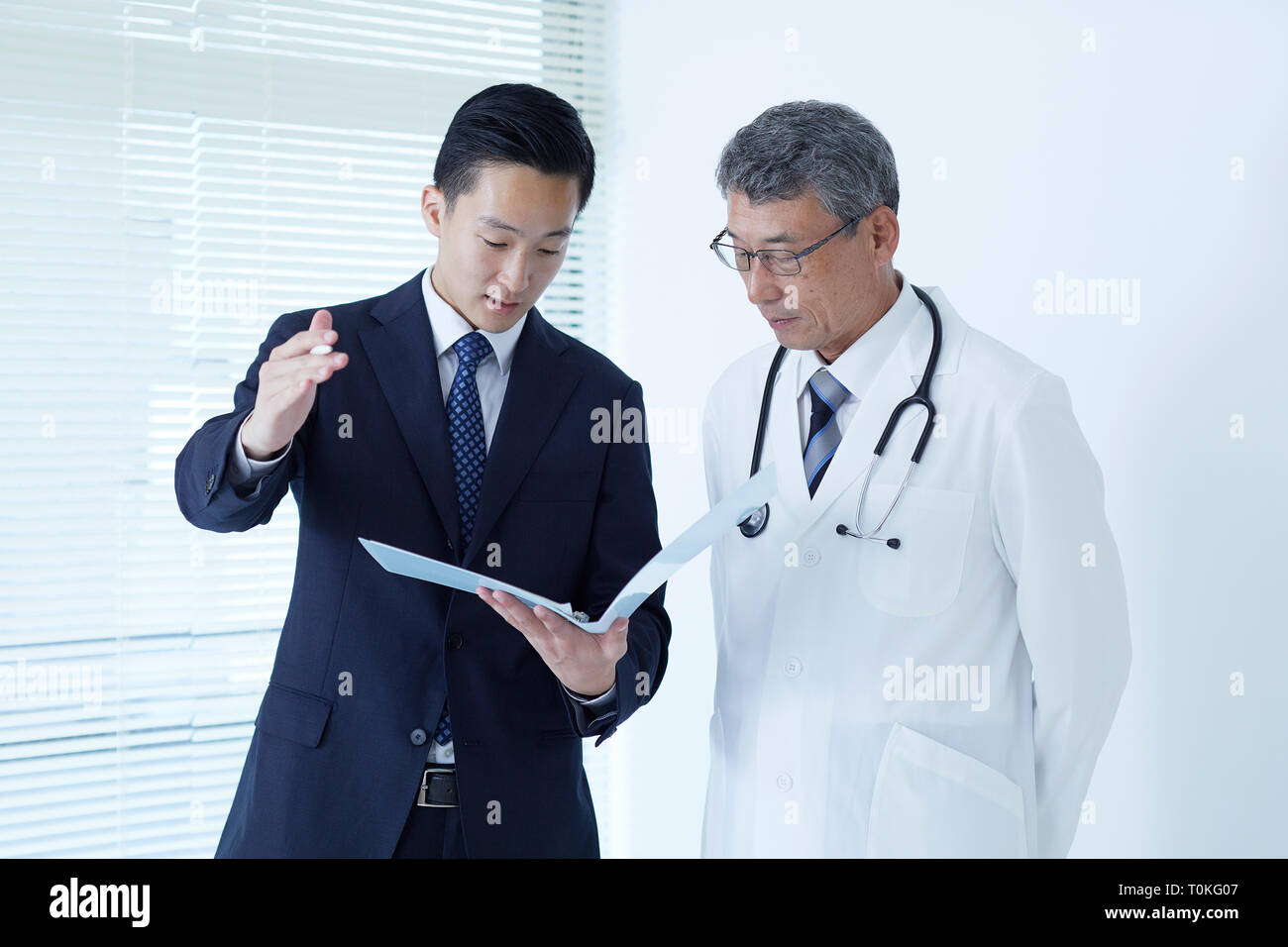 Japanese doctor at work Stock Photo - Alamy
