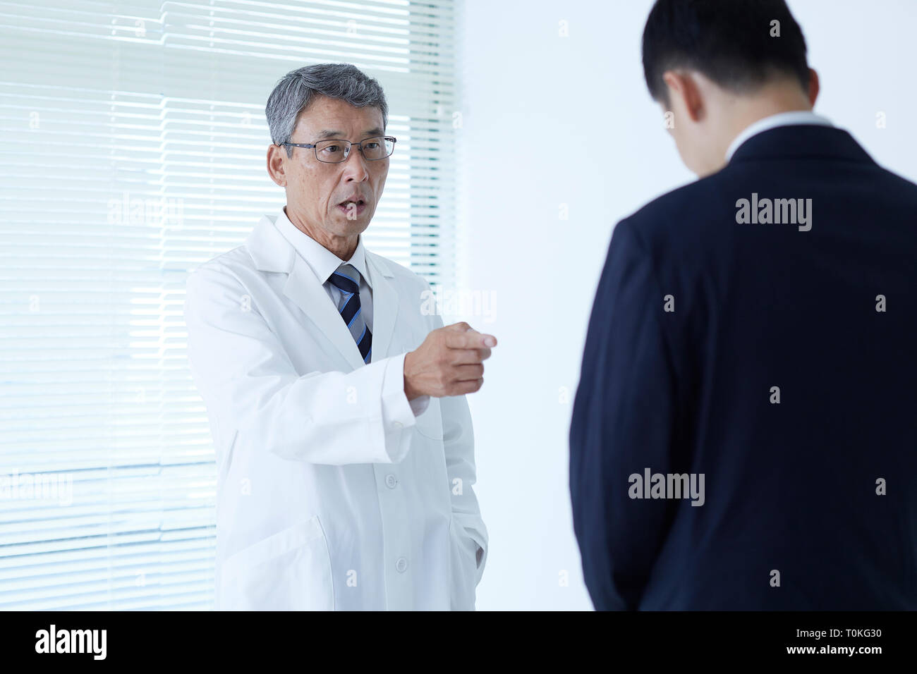 Japanese doctor at work Stock Photo - Alamy