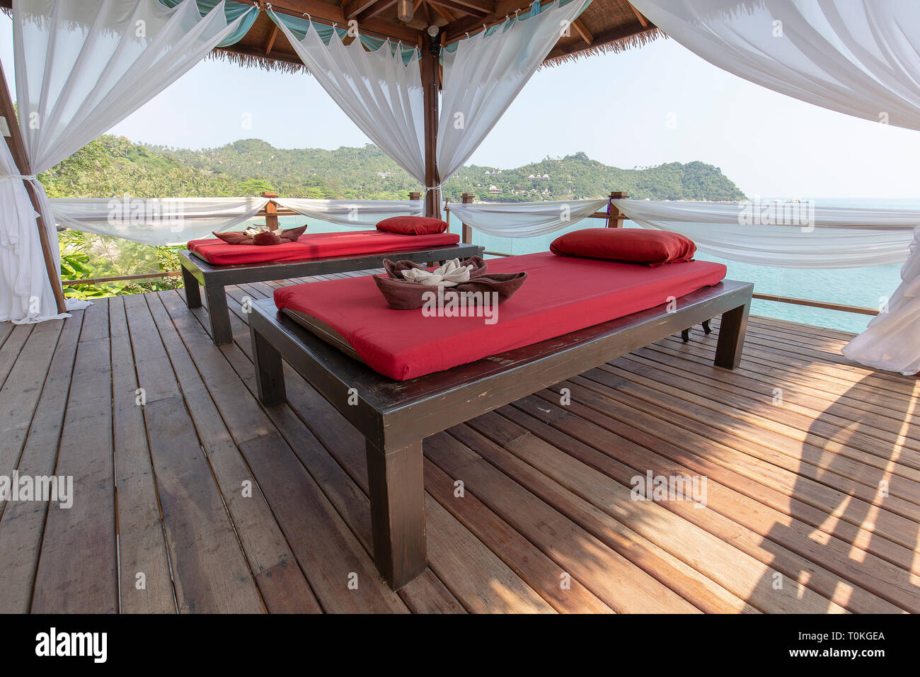 Massage table overlooking the sea. Spa massage room on the tropical beach in island Koh Phangan ...