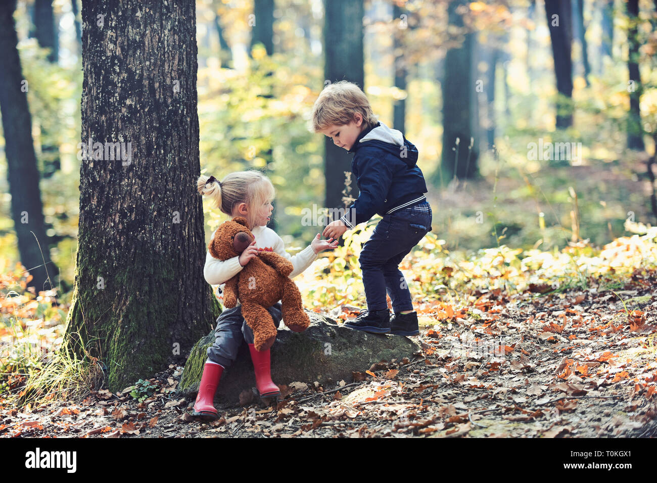 Little Girl Playing In The Woods