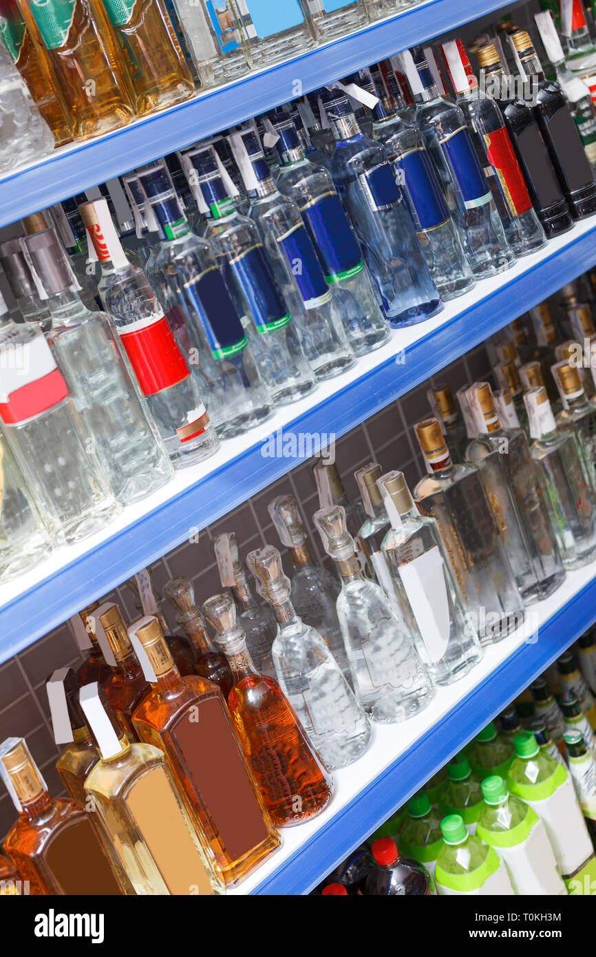 Image of various bottled alcohol drink at shelves in the supermarket ...