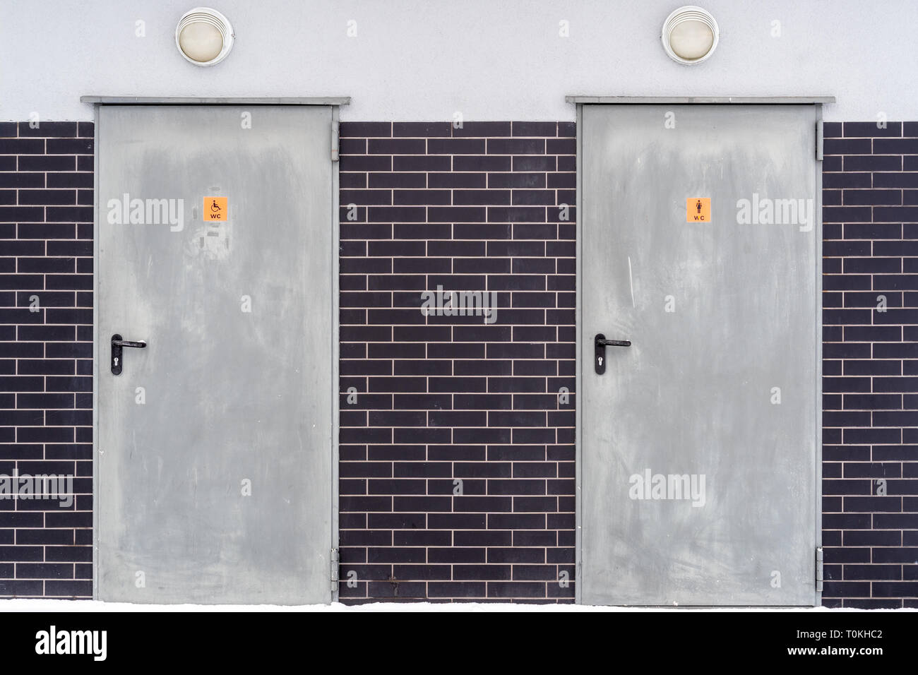 Metal doors of public toilet in the park Stock Photo - Alamy