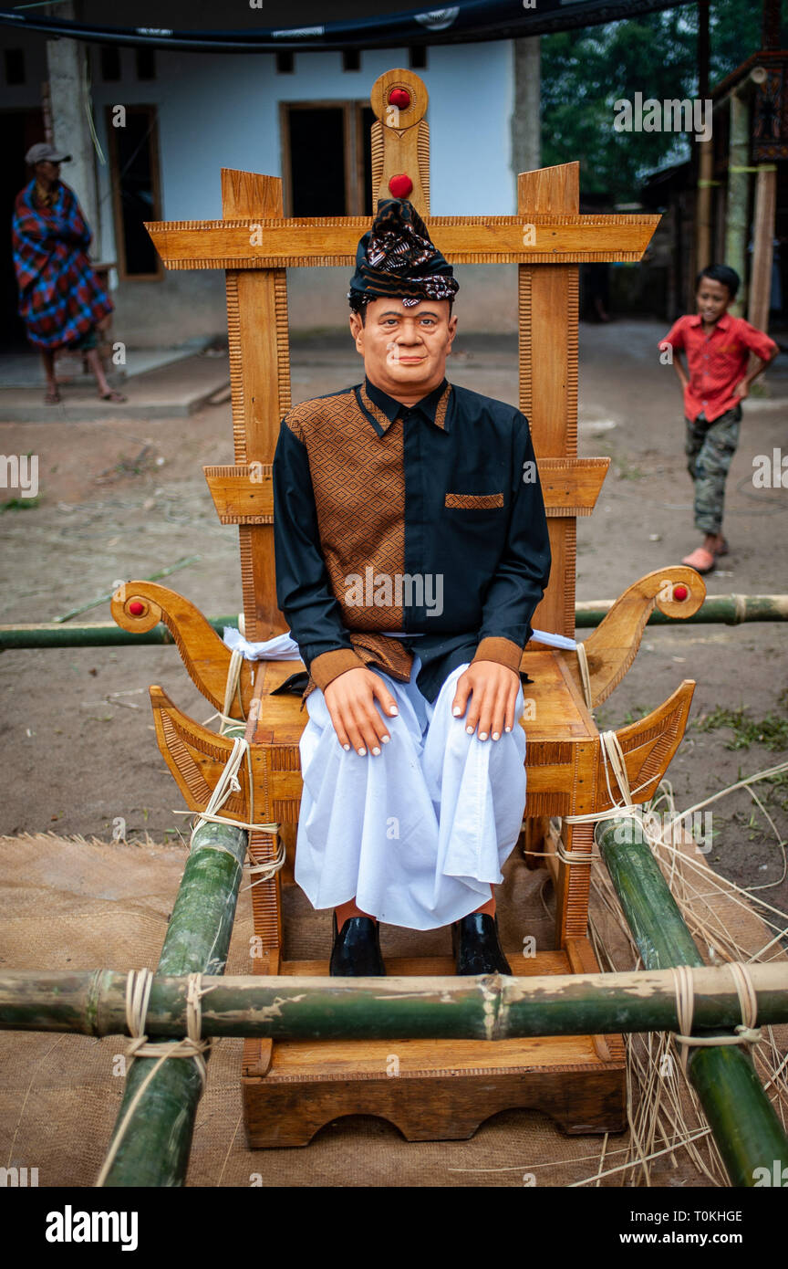 A Tau-tau, (a statue resembling a corpse) seen during the Rambu Solo ...