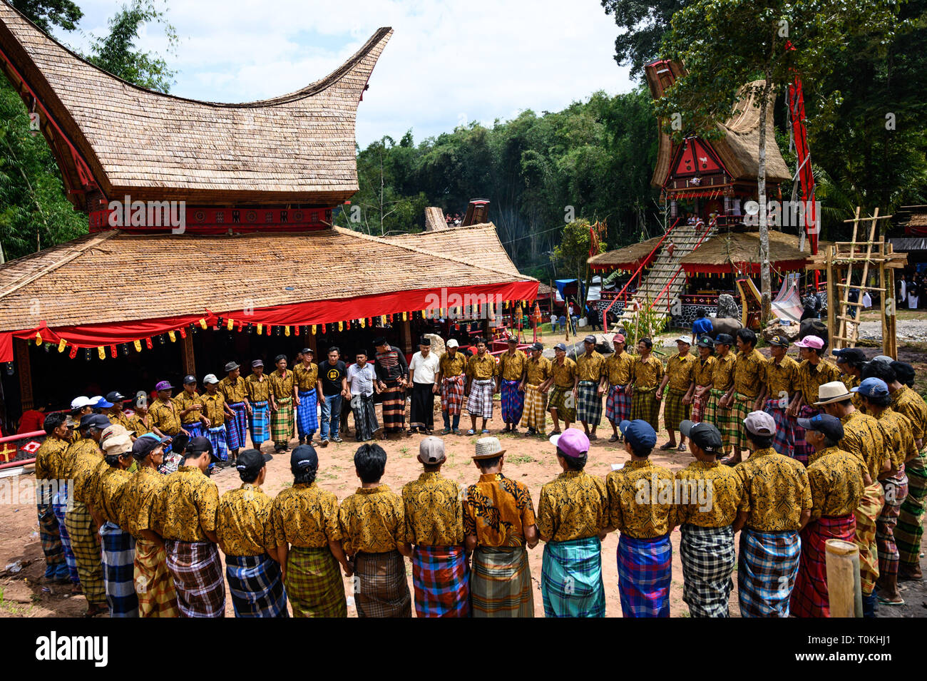 Residents are seen performing the ma'badong dance during the Rambu Solo ...