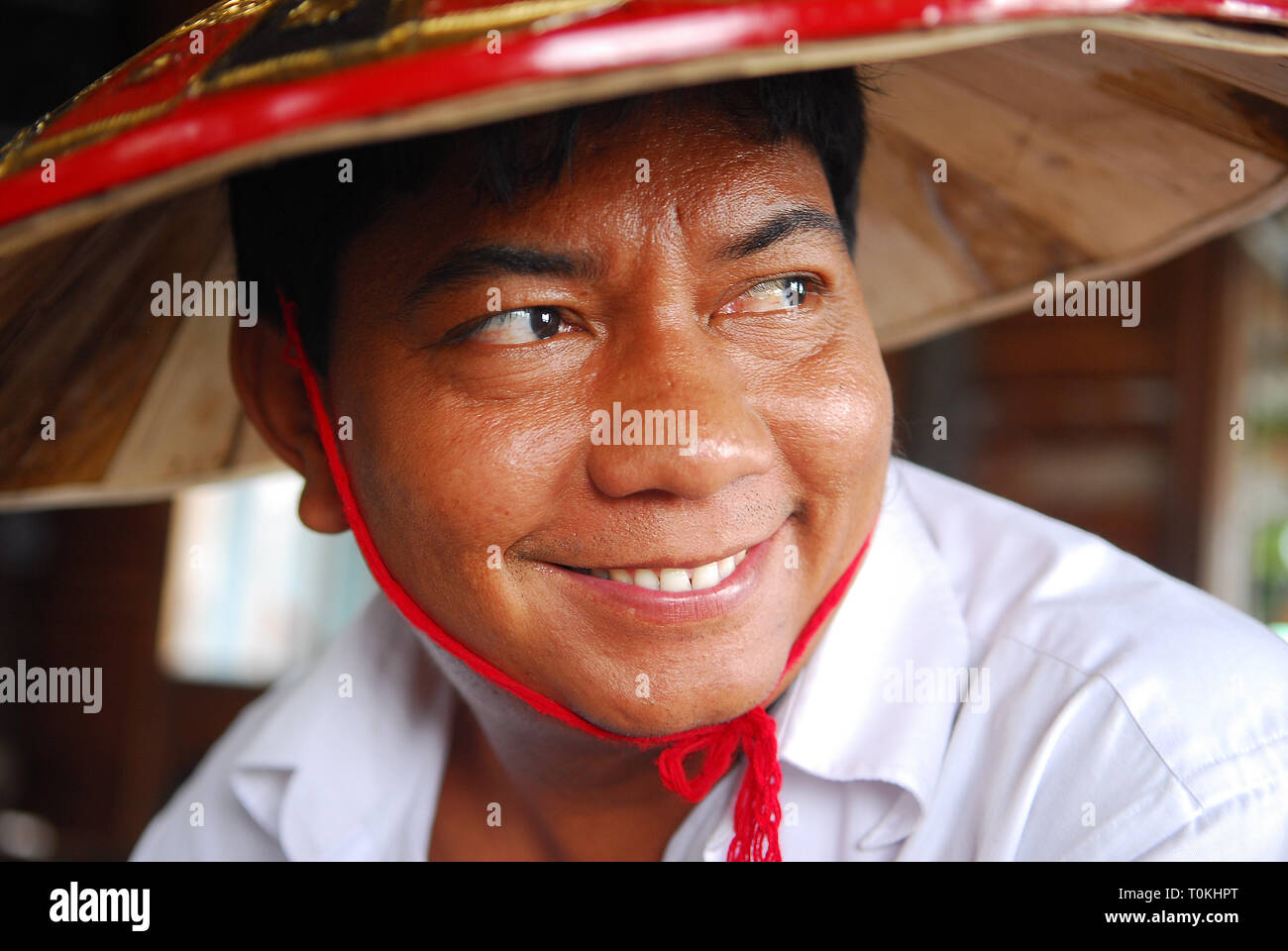 Smiling Burmese tour guide Stock Photo - Alamy