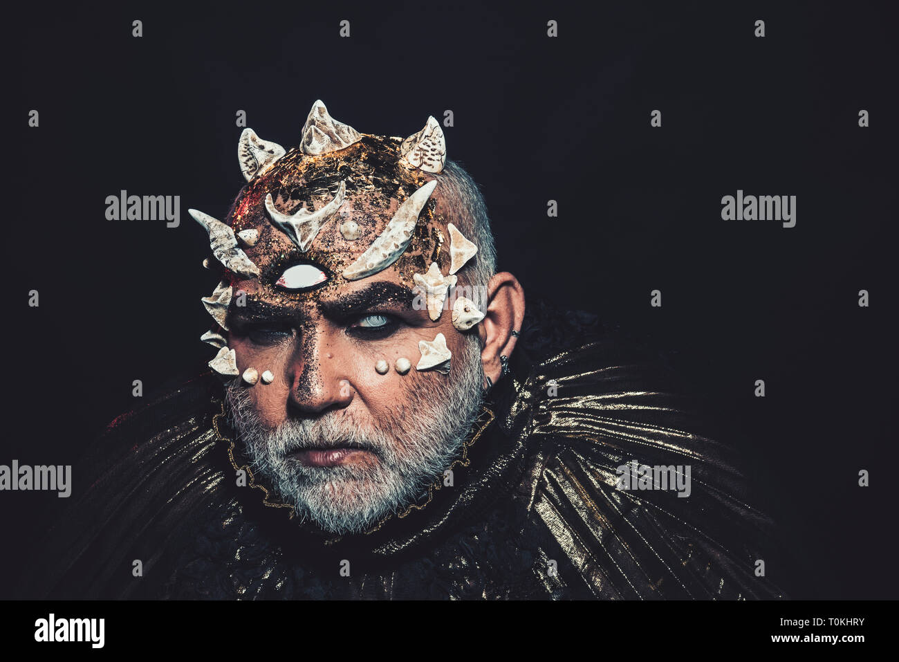 Alien, demon, sorcerer makeup. Man with third eye, thorns or warts ...