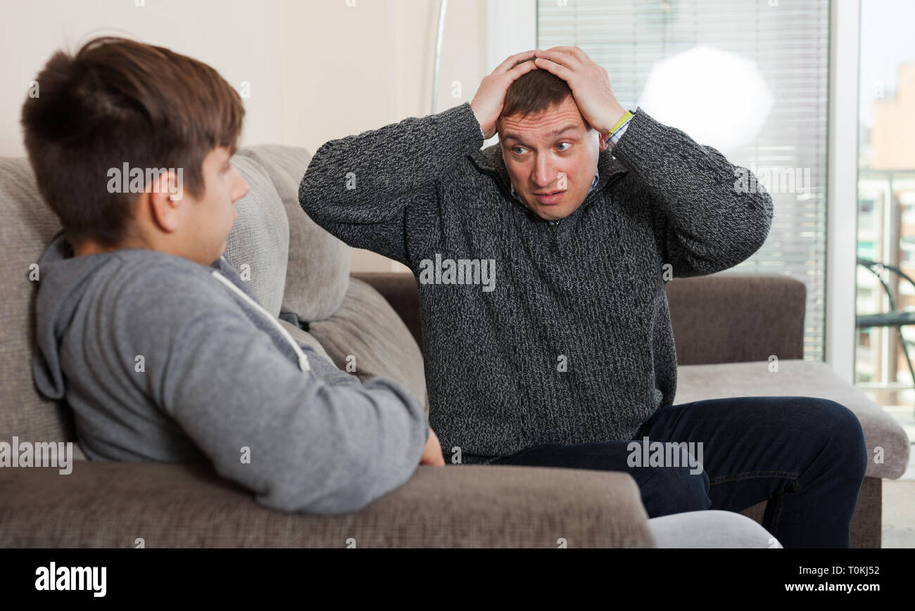 Father son angry offended hi-res stock photography and images - Alamy
