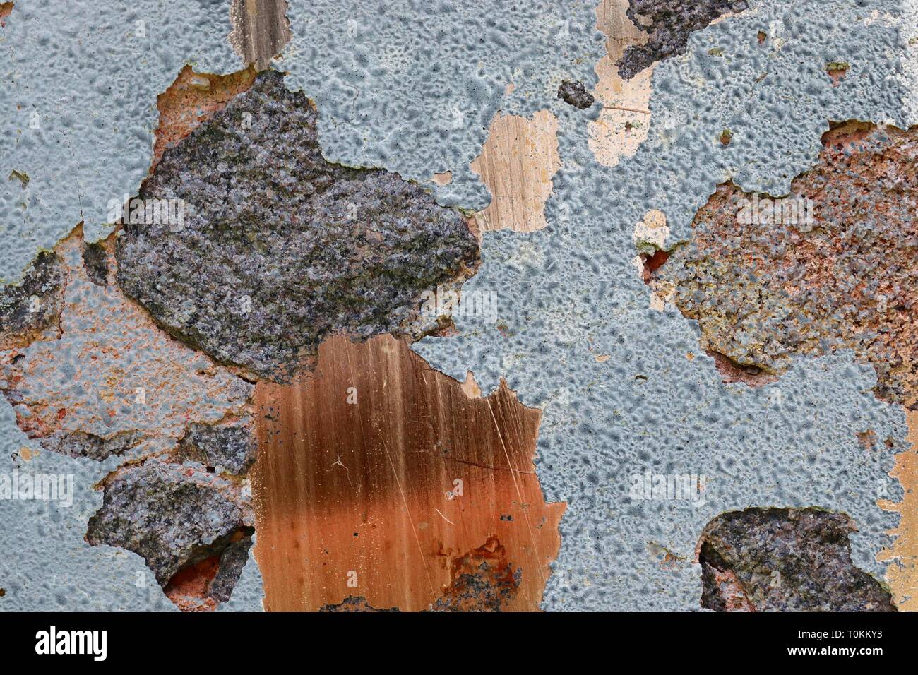 Close up detailed surface of weathered paint on different walls in high ...