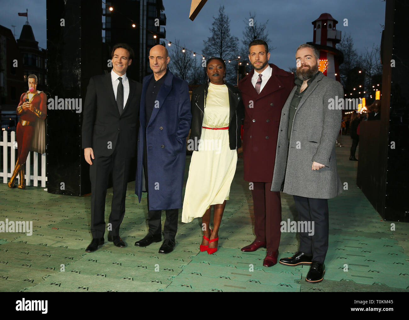 (left to right) Peter Safran, Mark Strong, Andi Osho, Zachary Levi and ...