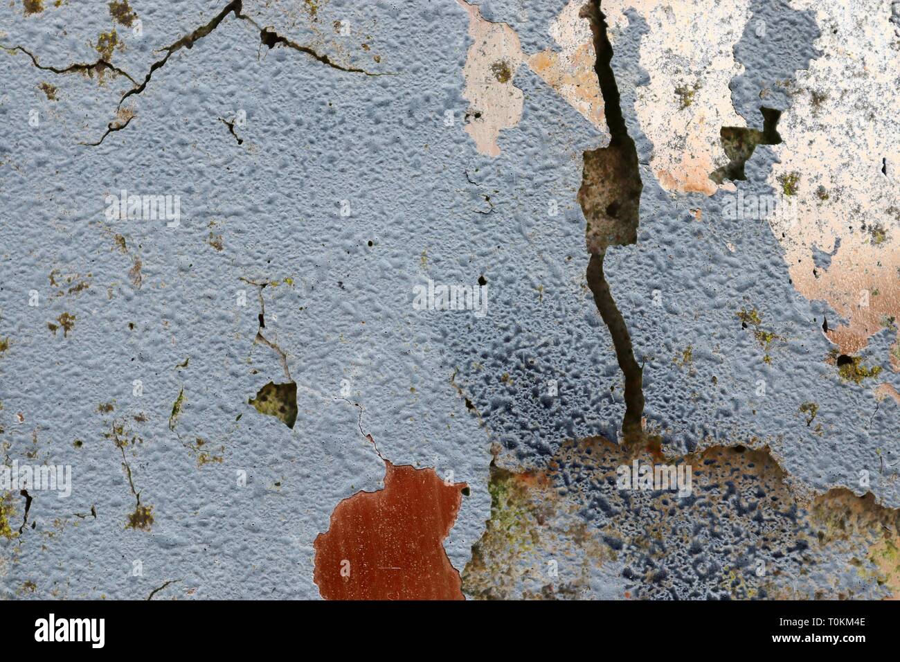Close up detailed surface of weathered paint on different walls in high ...