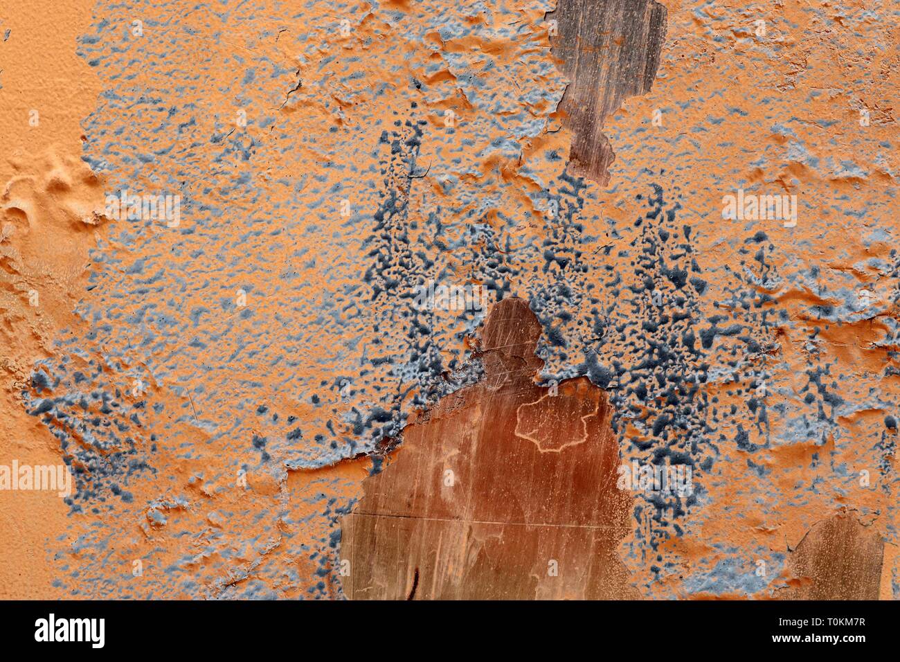 Close up detailed surface of weathered paint on different walls in high ...