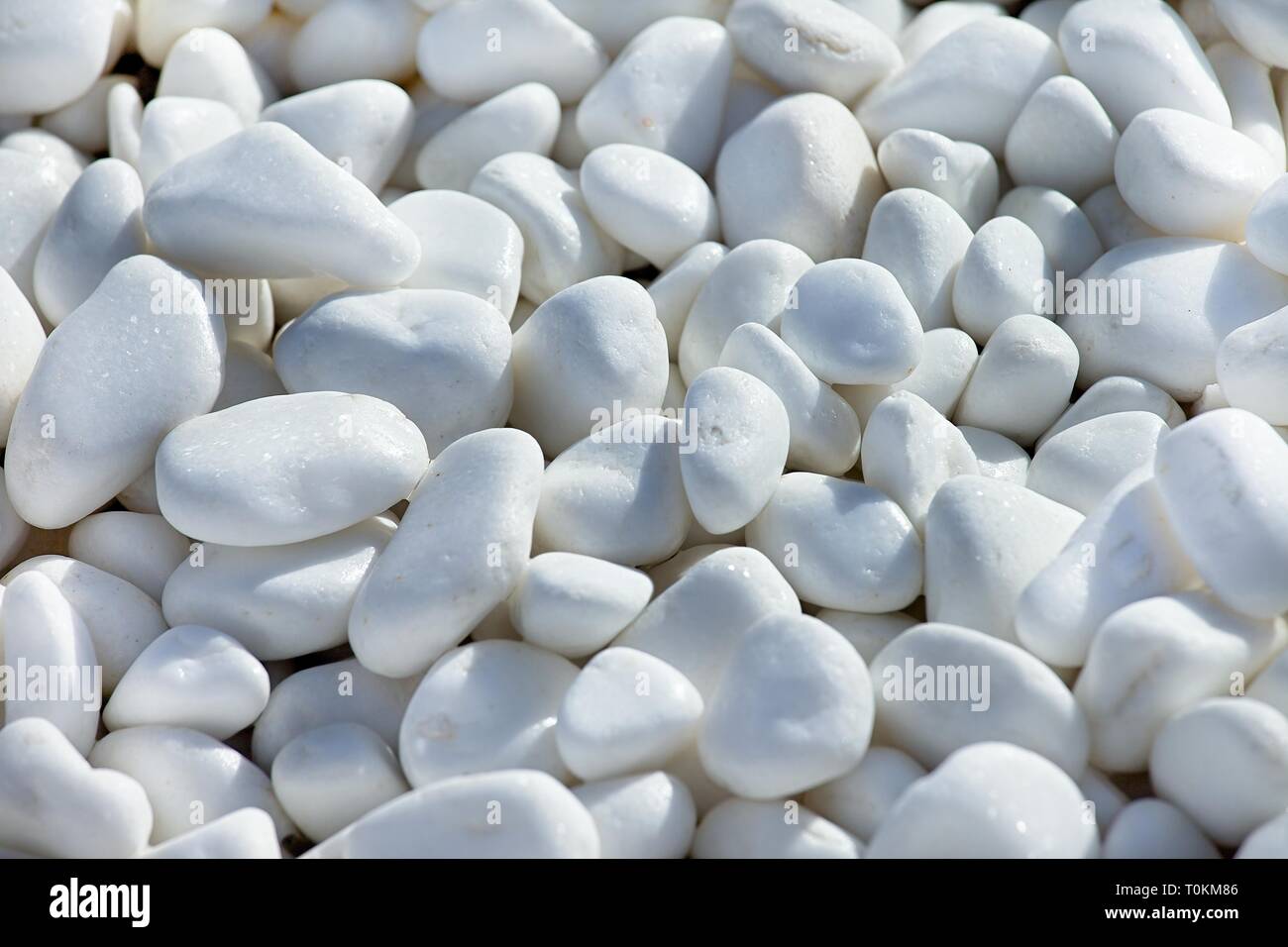White milky smooth stones in close up . Stock Image Stock Photo - Alamy