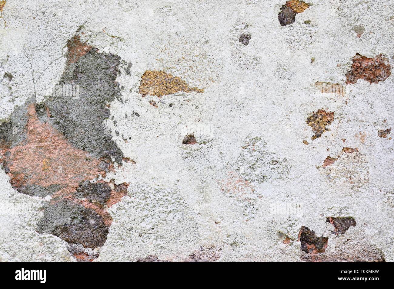 Close up detailed surface of weathered paint on different walls in high ...