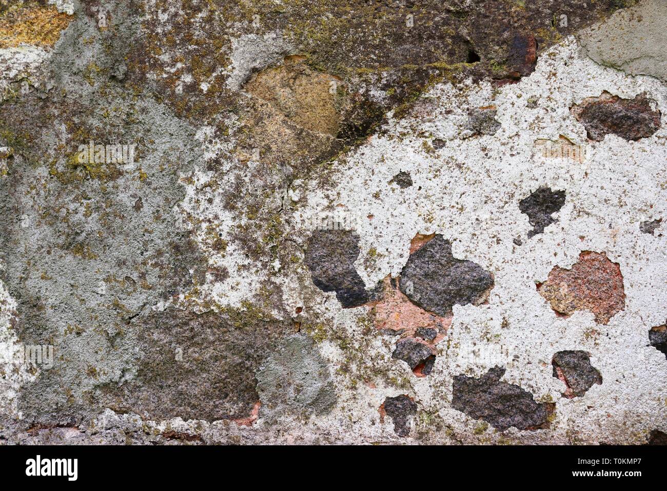 Close up detailed surface of weathered paint on different walls in high ...