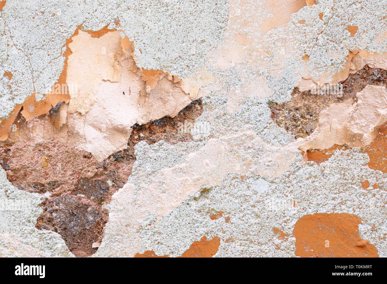 Close up detailed surface of weathered paint on different walls in high ...