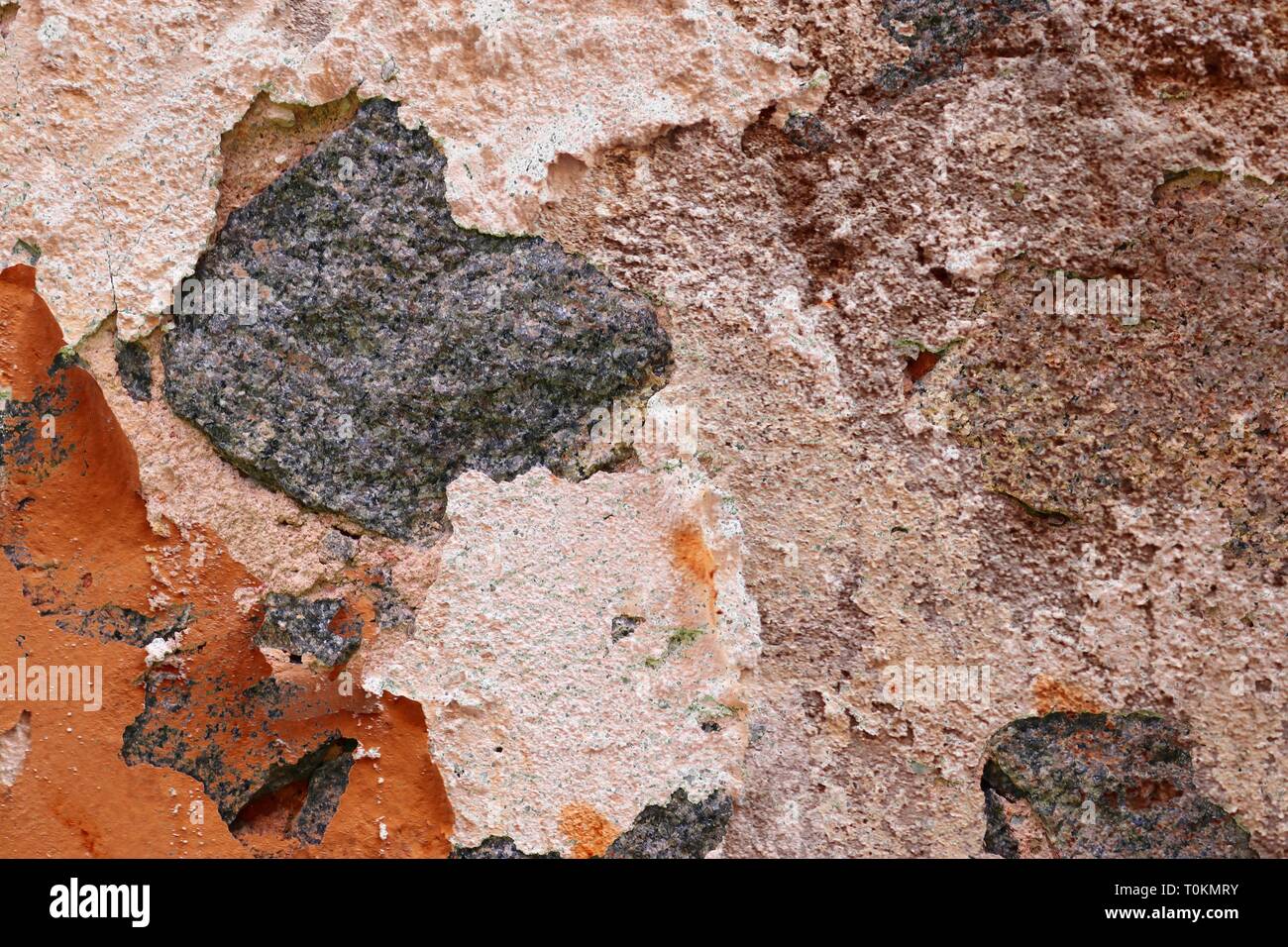 Close up detailed surface of weathered paint on different walls in high ...