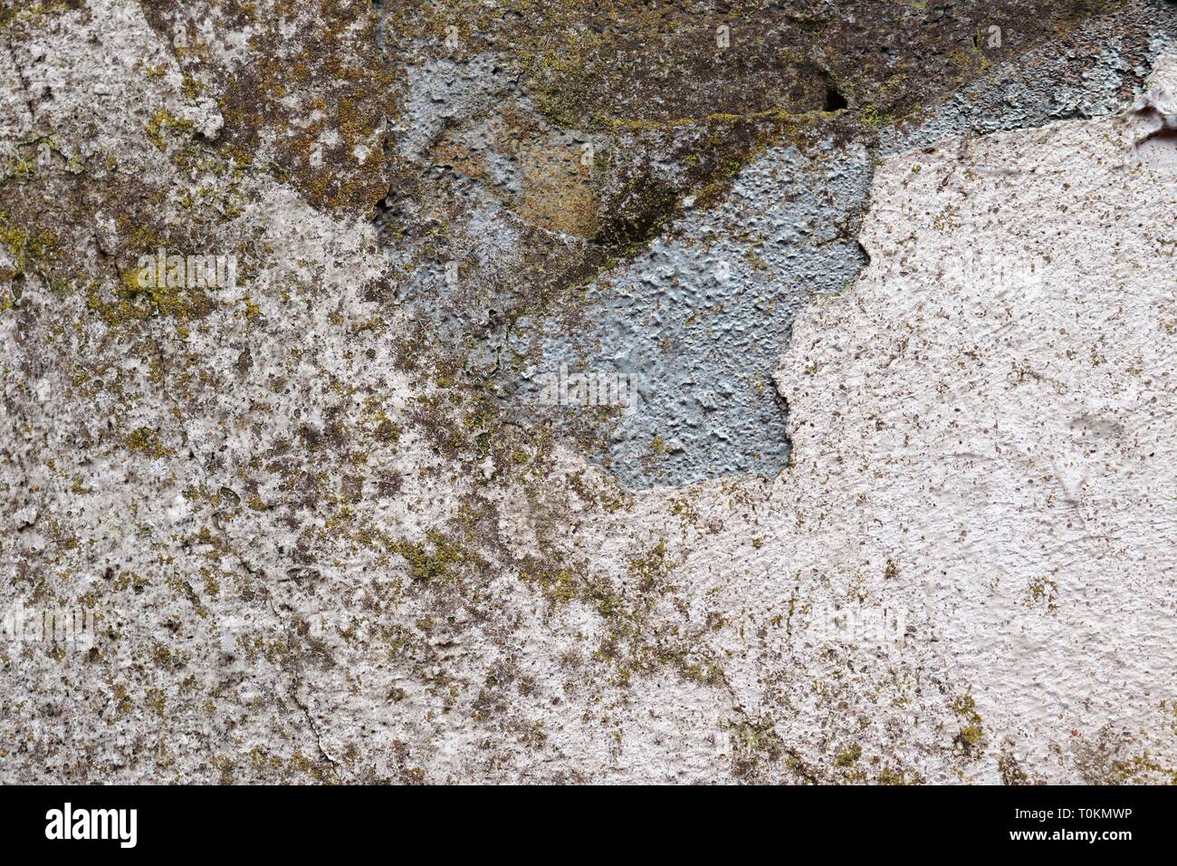 Close up detailed surface of weathered paint on different walls in high ...