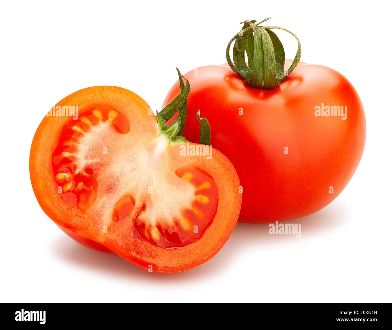 Two half cut tomato tomatoes hi-res stock photography and images - Alamy